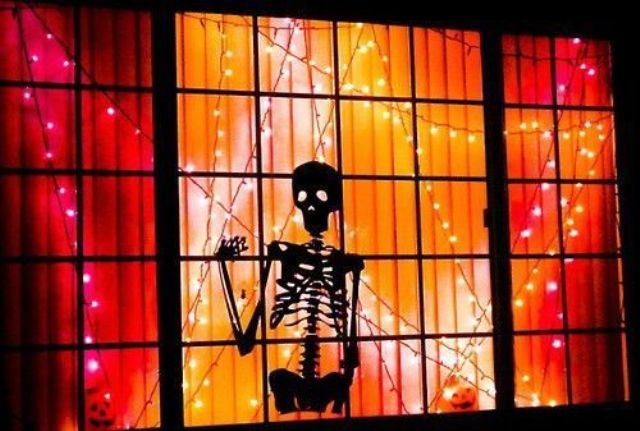 35 Creative Halloween Window Decor Ideas - DigsDigs