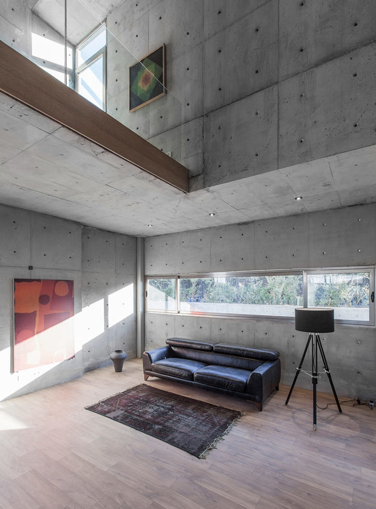 Multi-Level Concrete Villa 131 With Industrial Interior - DigsDigs