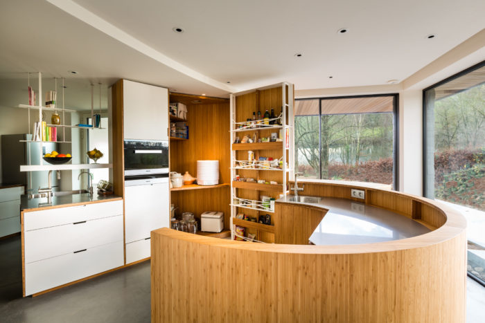 Practical Vibrant Kitchen With Minimalist Cabinets - DigsDigs