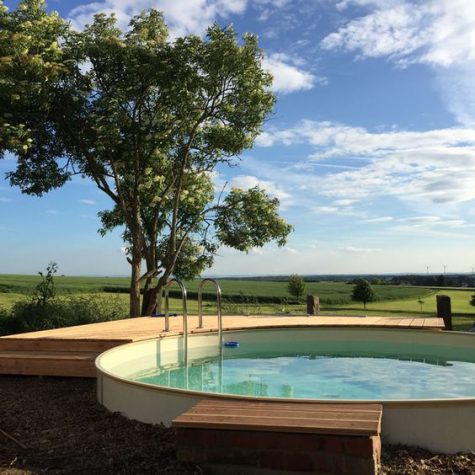 23 Round Pools You'll Never Want To Leave - DigsDigs