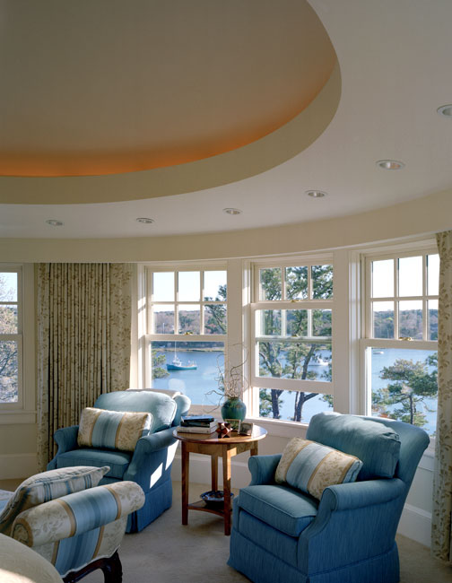 Curved House Design with Extensive Interior Woodwork - DigsDigs