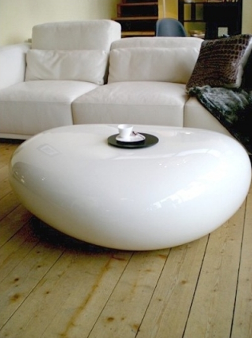 Modern And Functional Philosophical Table And Pouf In One - DigsDigs