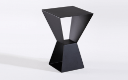 Modern Trapezoidal Side Table To Use As A Display Stand - DigsDigs