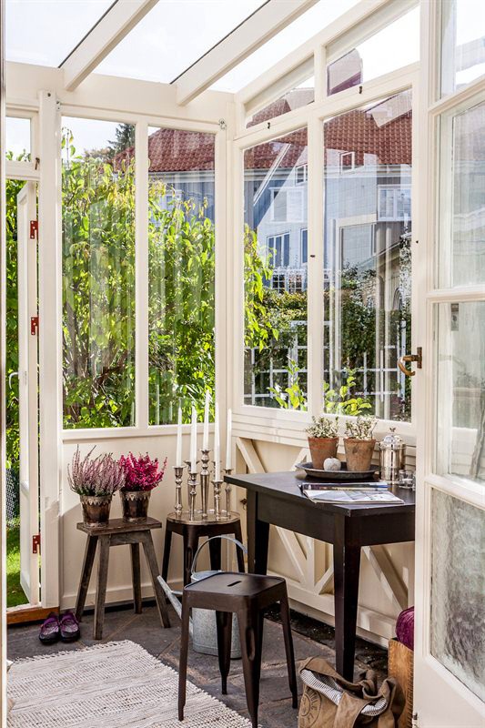 Vintage Glass Veranda Designed For Relaxation - DigsDigs